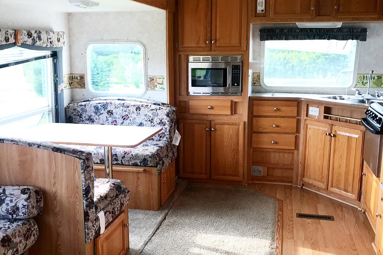 Modern rustic travel trailer renovation by @joineryanddesignco