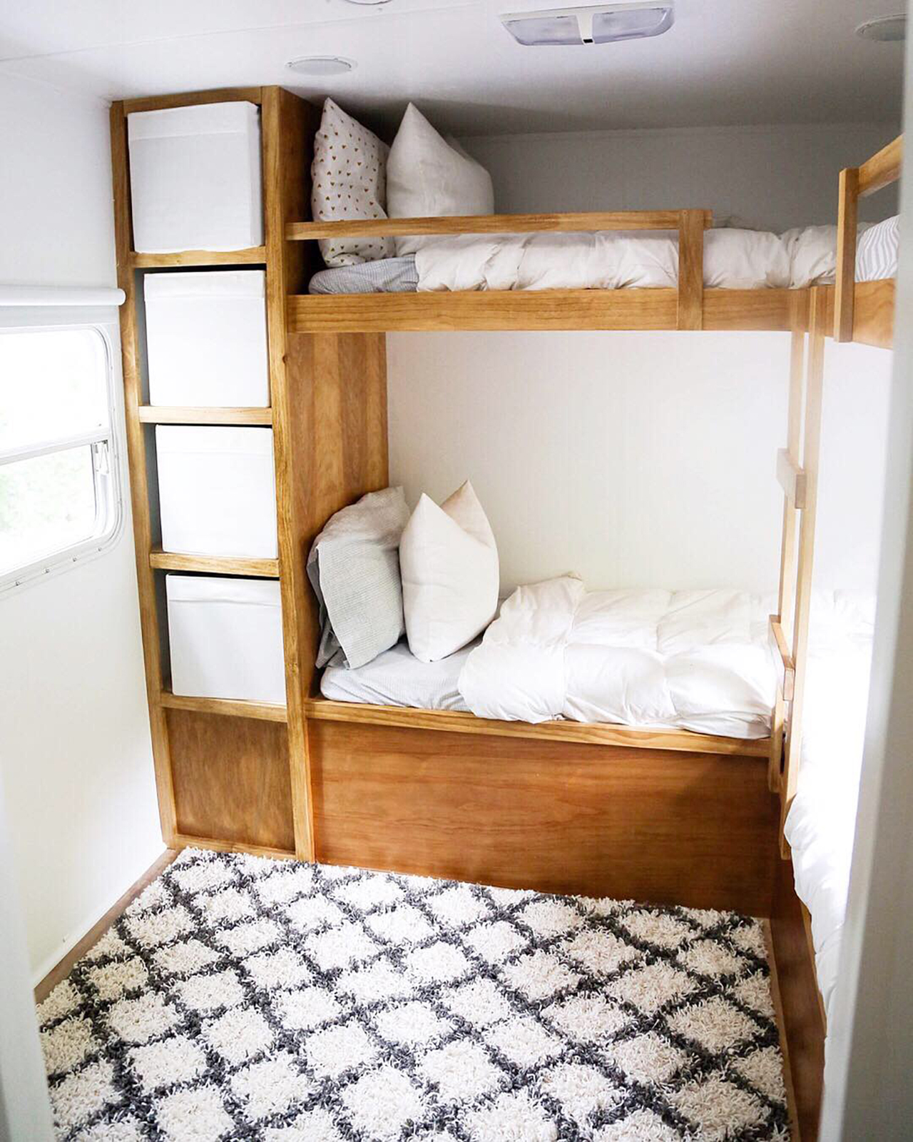 Modern rustic travel trailer renovation by @joineryanddesignco