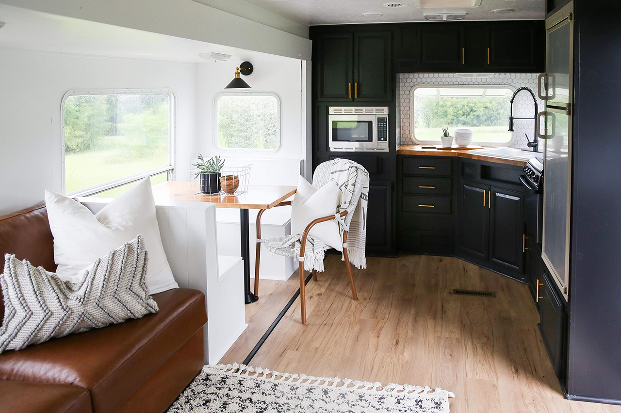 Modern rustic travel trailer renovation by @joineryanddesignco