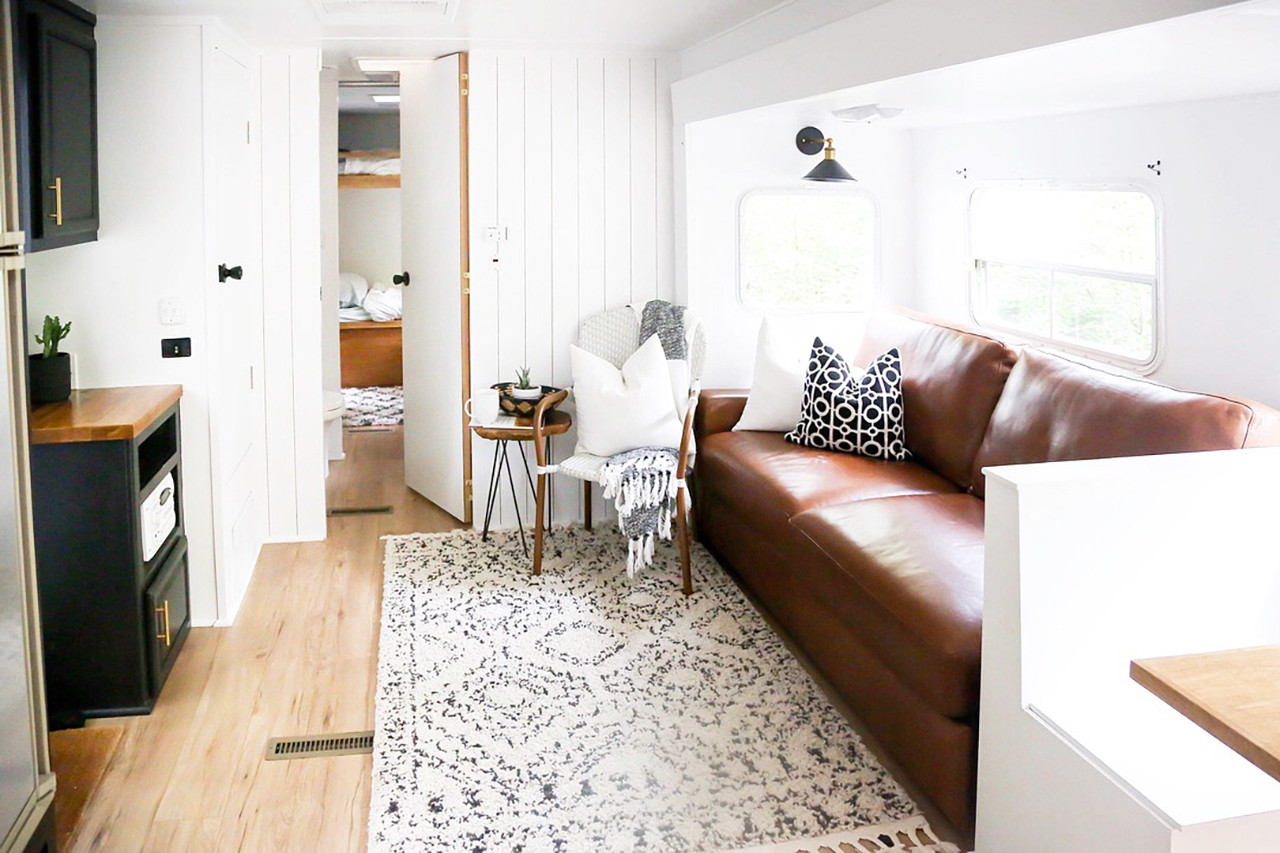 Modern rustic travel trailer renovation by @joineryanddesignco