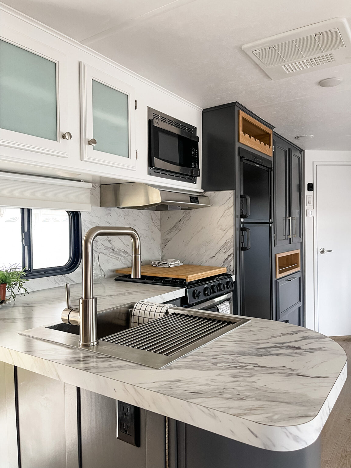 Modern Travel Trailer renovated by @rvingdogsandwine