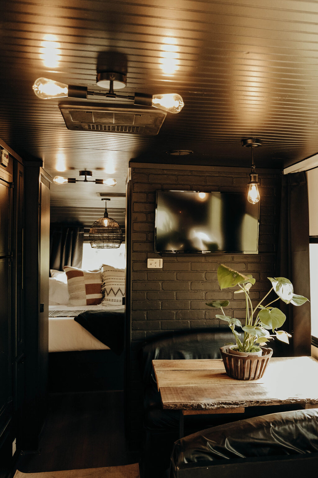 This moody RV interior includes a preserved moss wall